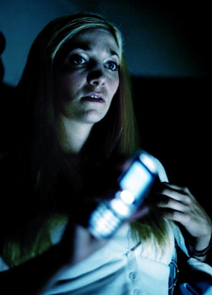 Aimee Denaro as Katherine in the stairwell of The Supreme Court of New ...